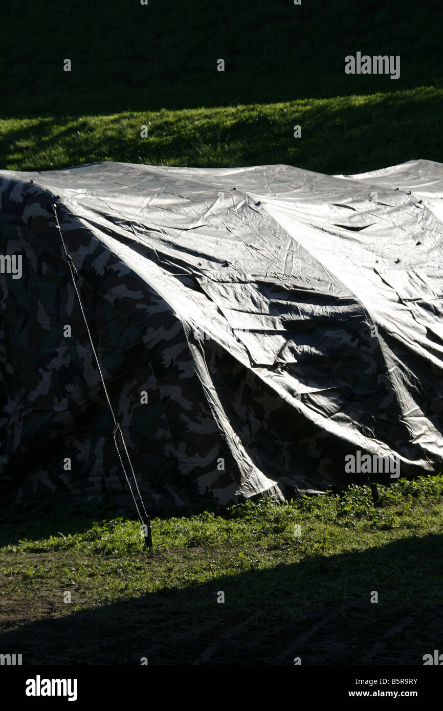 camouflage military army base tent at open day Stock Photo - Alamy