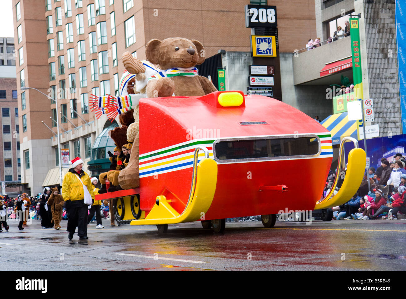 large float santa claus street parade red bear Stock Photo - Alamy