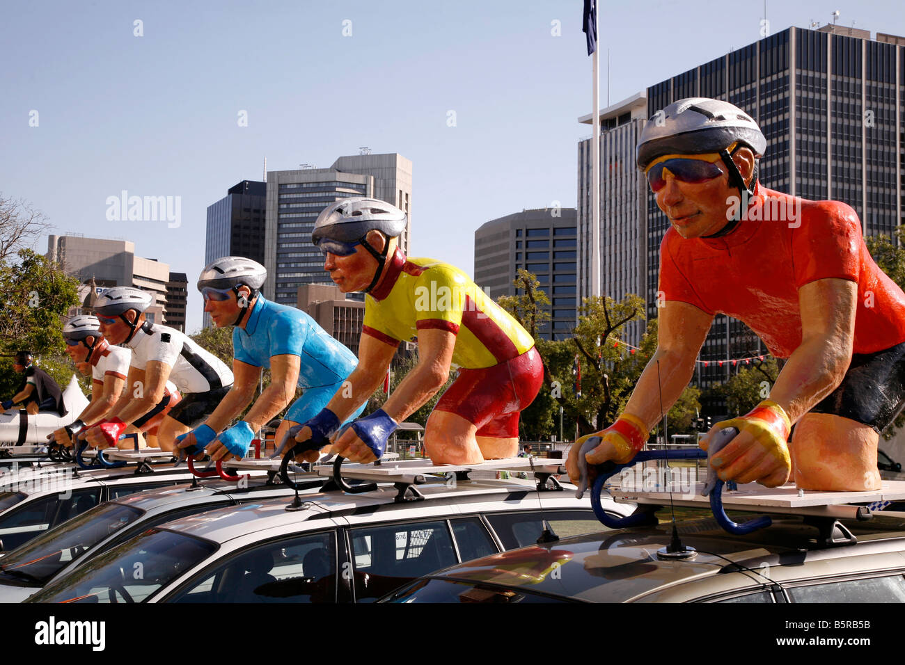 racing cyclist figures on a car Stock Photo - Alamy