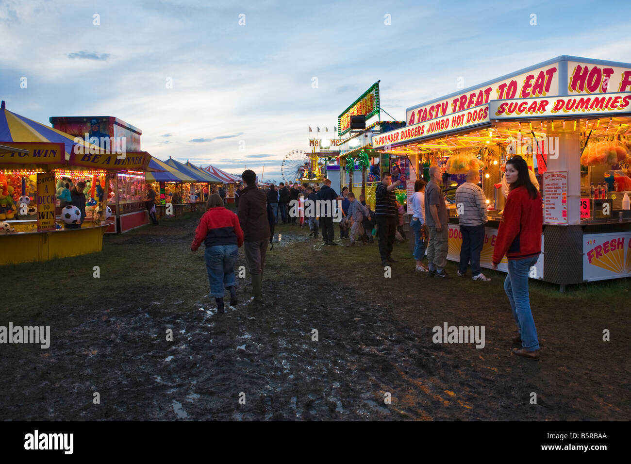 Photograph of various rides at a fun fair (specifically 'The Hoppings ...