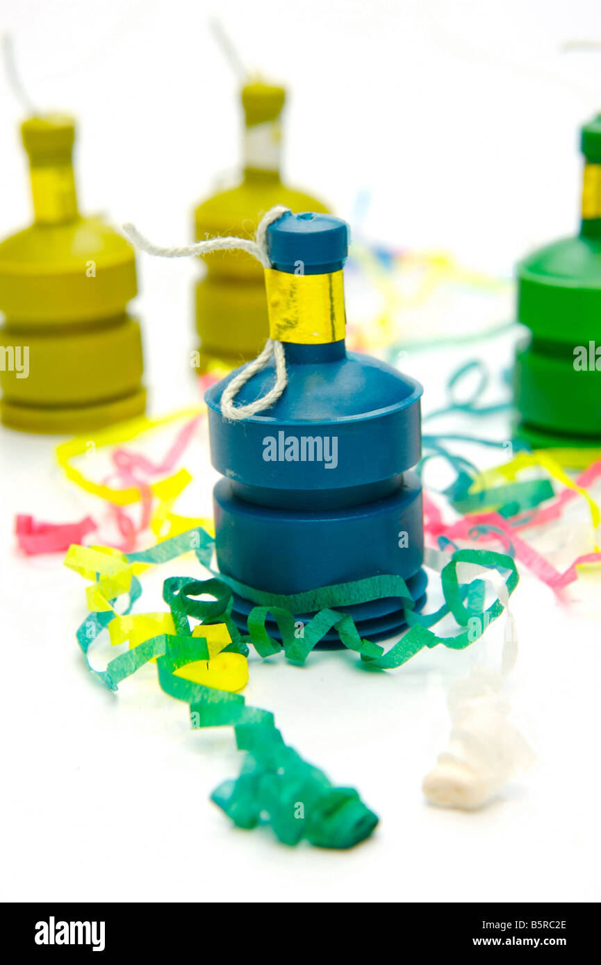 Party poppers isolated against a white background Stock Photo - Alamy