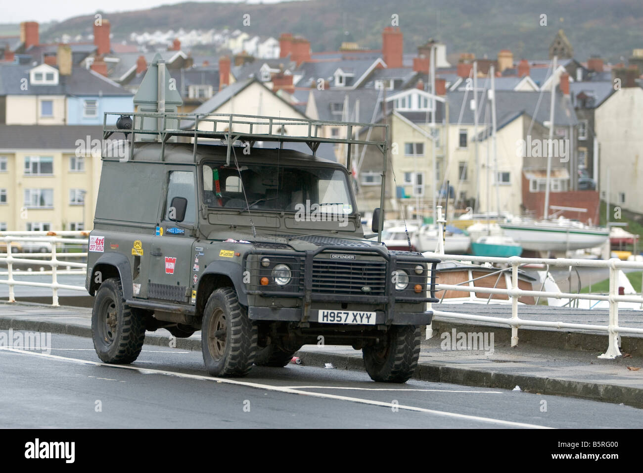 Land Rover Defender parked at the Aberystwyth Marina Stock Photo - Alamy