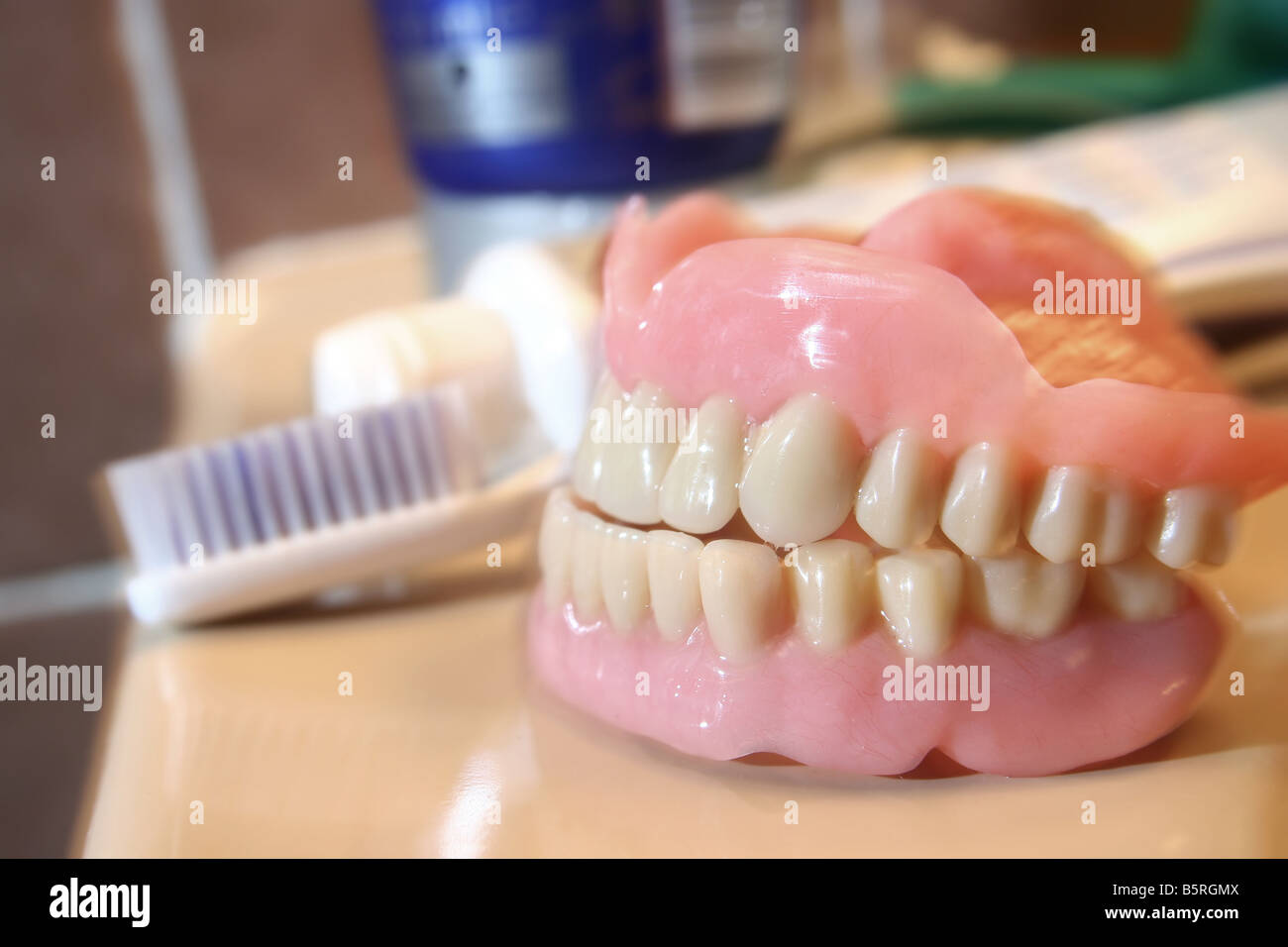 Denture toothbrush hi-res stock photography and images - Alamy