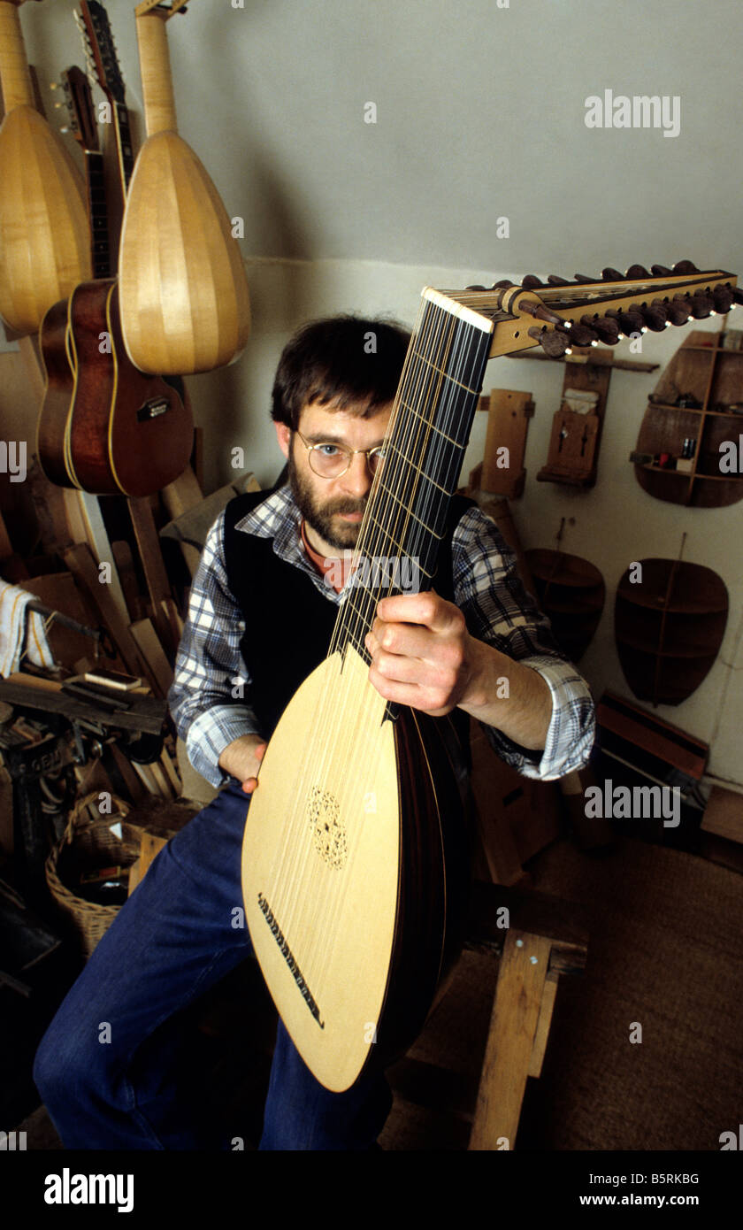 Luthier holding Lute - UK Stock Photo - Alamy