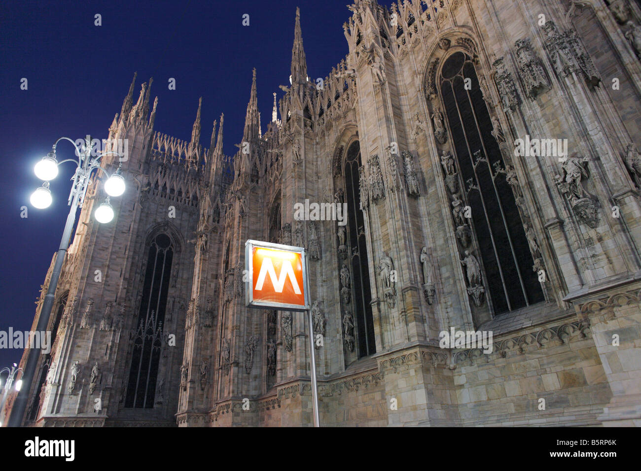 Metro sign at night near Duomo Cathedral, Milan, Italy Stock Photo - Alamy