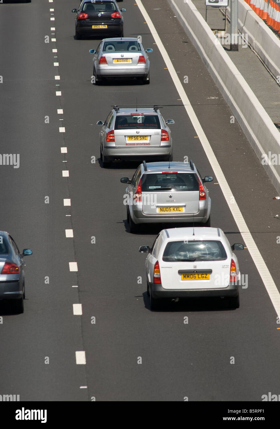 Queues of traffic travelling along the busy m1 motorway in the uk Stock ...