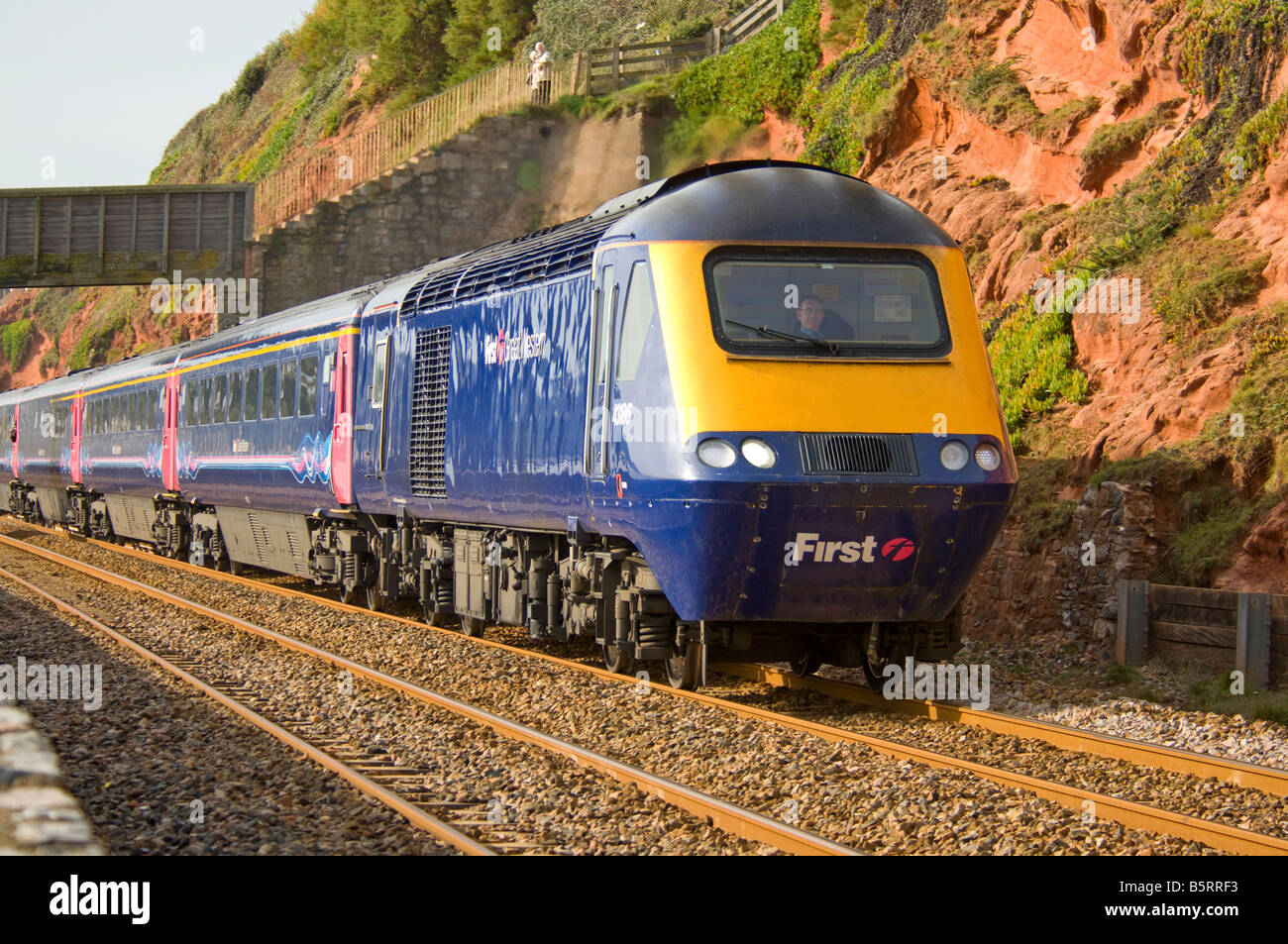 The intercity train running along the coastal line at Dawlish Stock ...