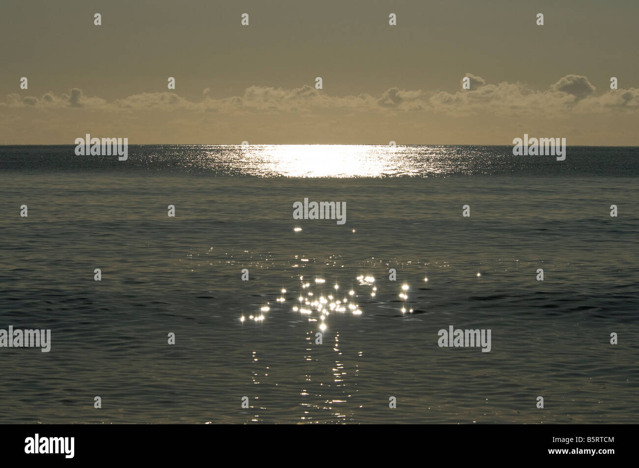 Dappled sunlight on the sea at Dawlish. The colours are natural ! Stock ...