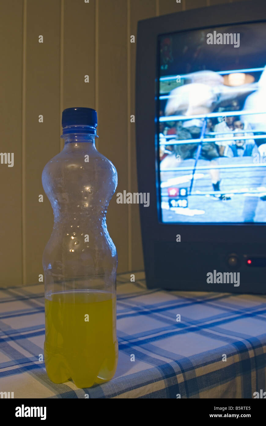 plastic bottle in front of television Stock Photo - Alamy
