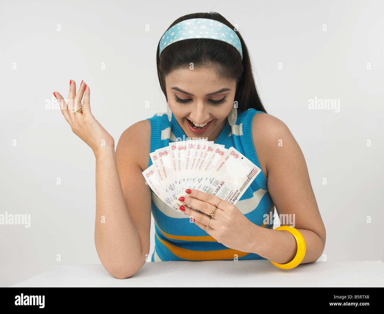 asian lady with currency notes Stock Photo - Alamy