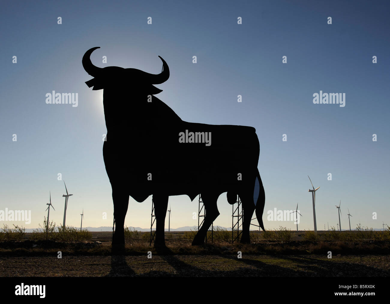 Wind turbines and the Spanish roadside bull or Toro de Osborne in Spain ...