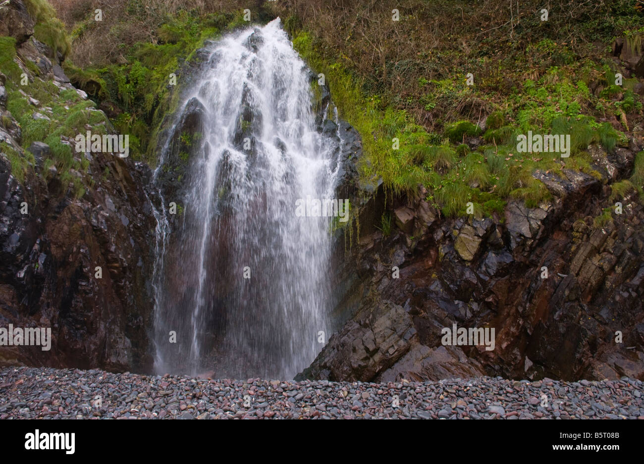 Waterfall on the beach near the coastal village of Clovelly North Devon ...