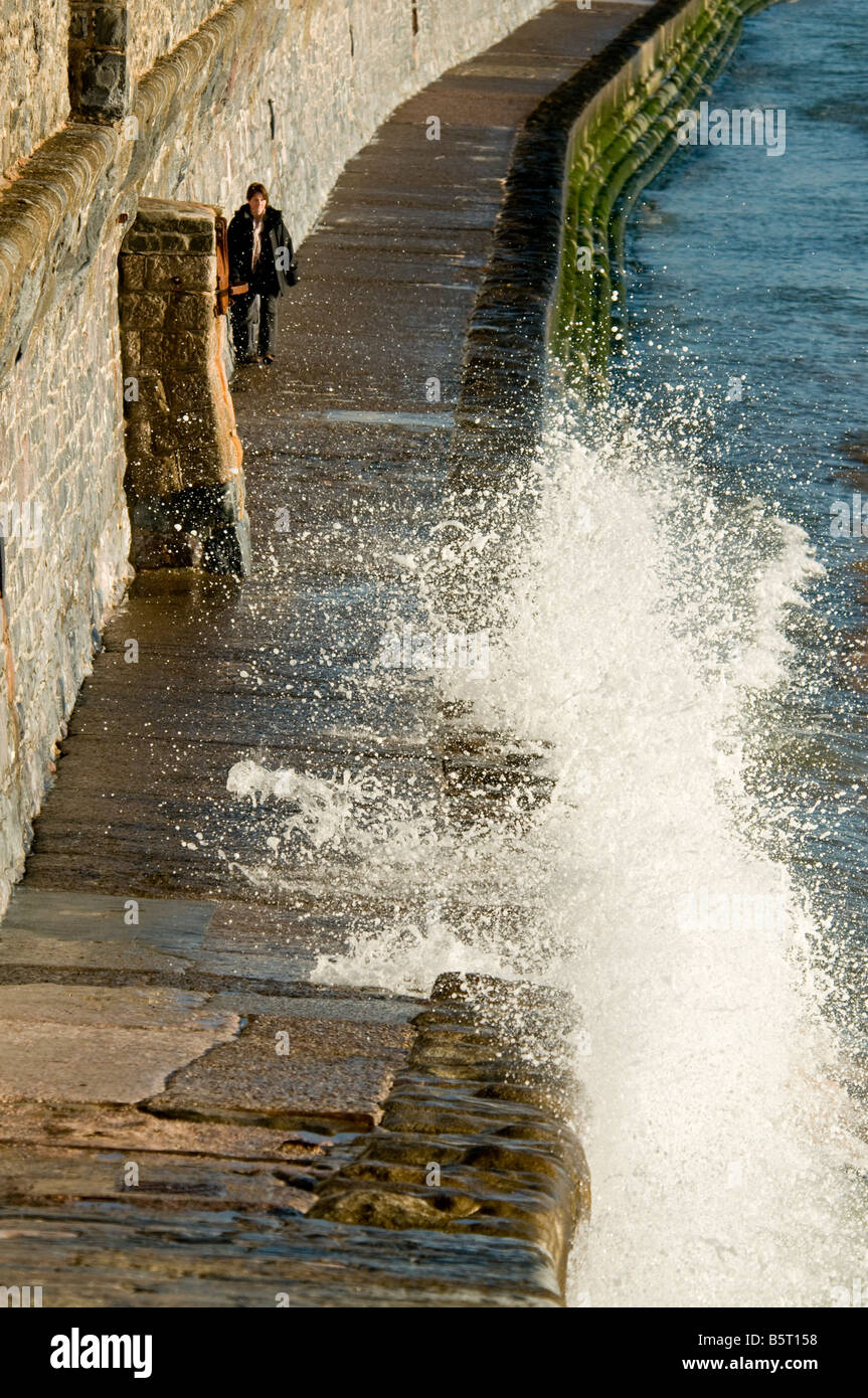 Waves breaking on sea defence wall hi-res stock photography and images ...