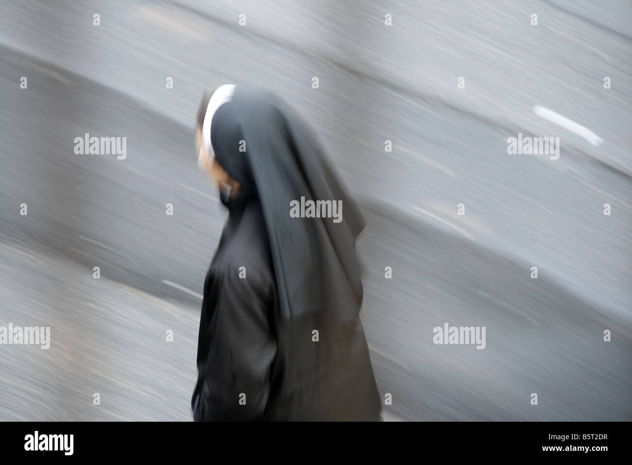 Nun crossing the road hi-res stock photography and images - Alamy