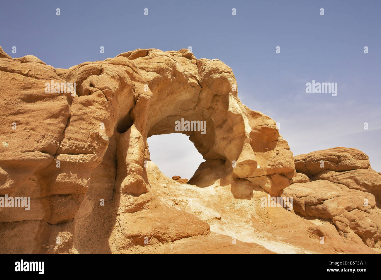 Natural picturesque erosive arch in hills from red sandstone Stock ...