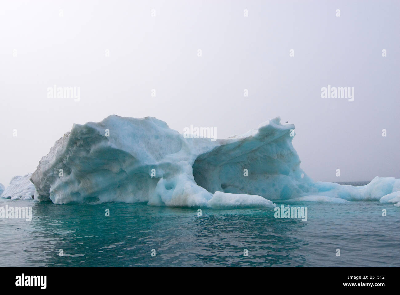 iceberg floating in the Beaufort Sea Arctic Ocean off the coast of the ...