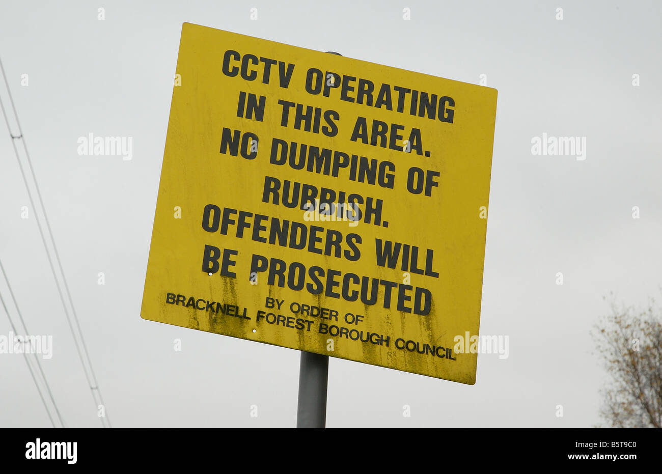 A Yellow CCTV warning sign Stock Photo - Alamy