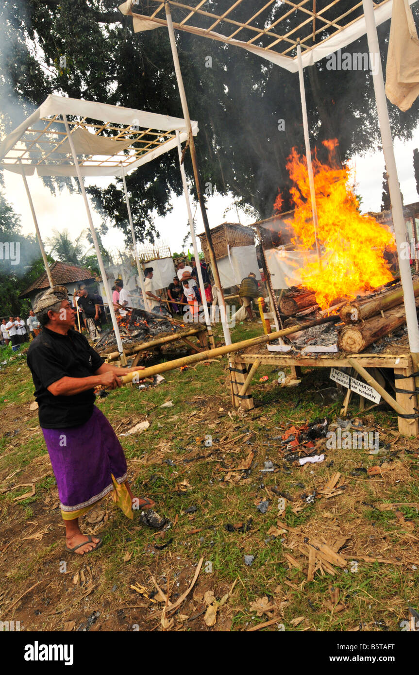 Balinese man is burning up coffin at cremation ceremony, Bali,Indonesia ...