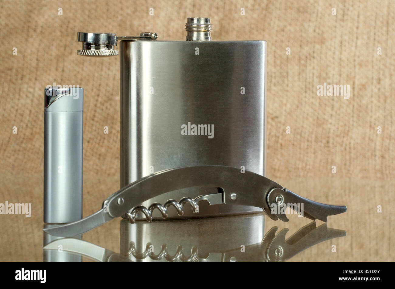 Small metal flask for carrying alcohol Stock Photo - Alamy