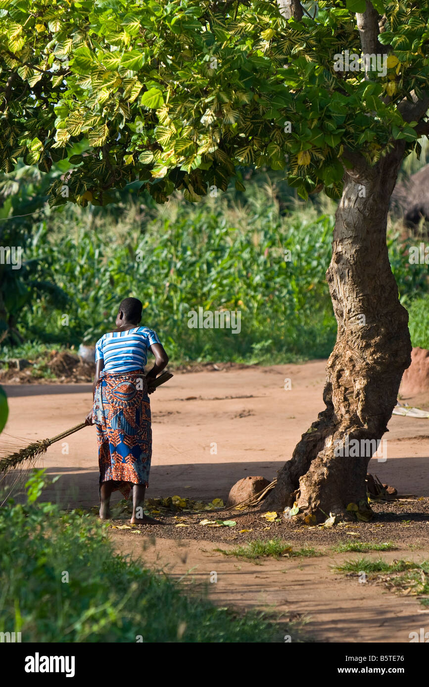 Woman sweeping africa hi-res stock photography and images - Alamy
