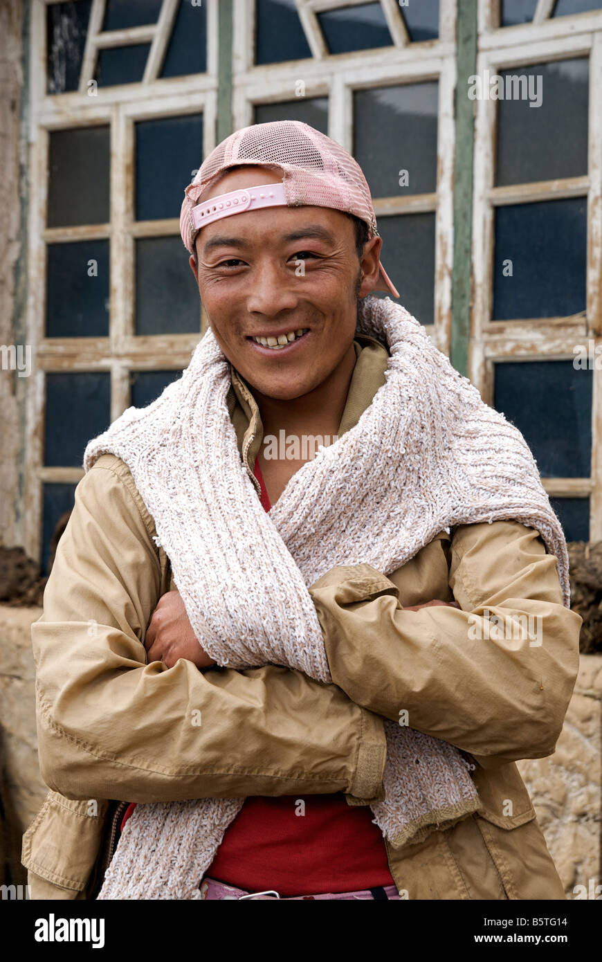 Friendly Tibetan man from rural hamlet posng for a portrait. Tibet ...