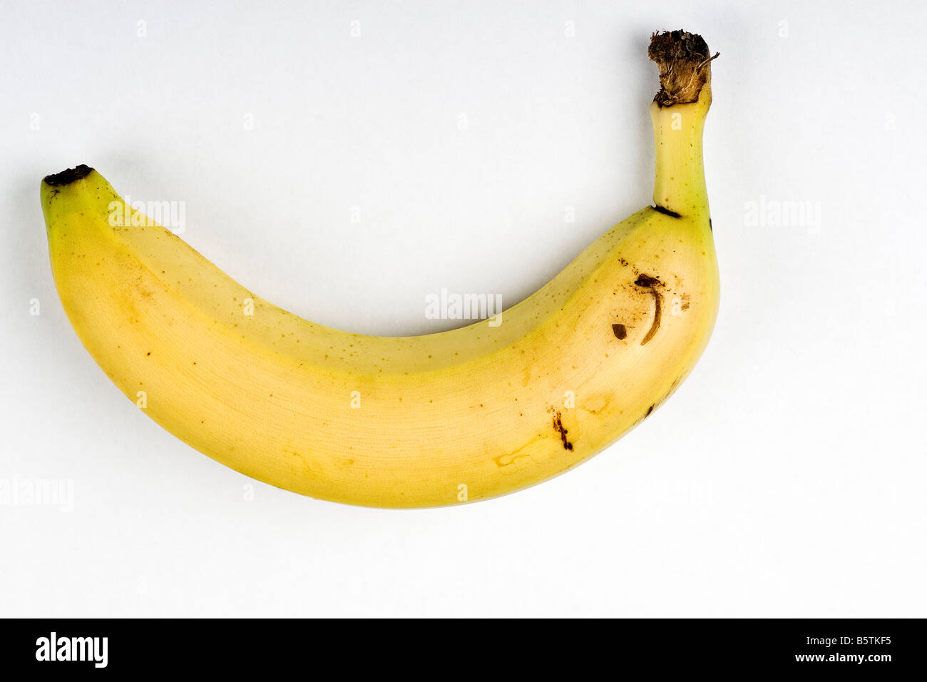 A whole ripe banana Stock Photo - Alamy