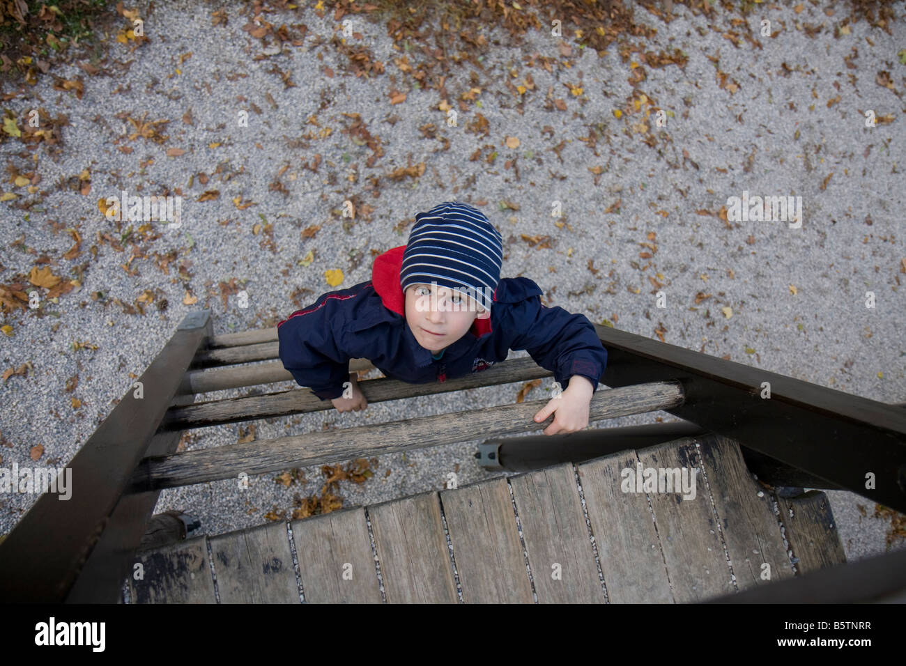 little boy climbing up ladder Stock Photo - Alamy little boy climbing up ladder Stock Photo - Alamy