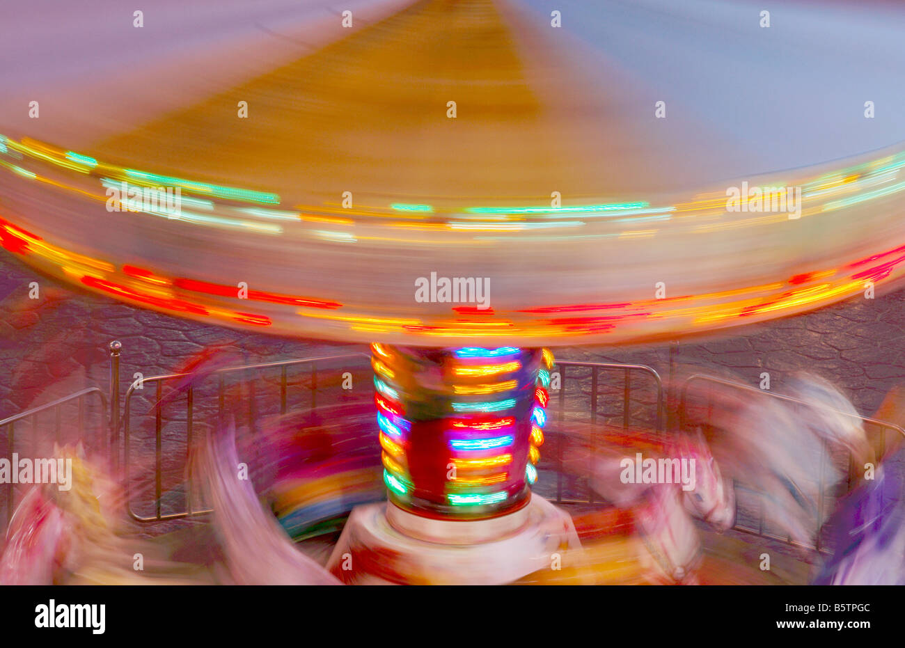 Fairground carousel ride at night in Holiday World at Maspalomas on ...