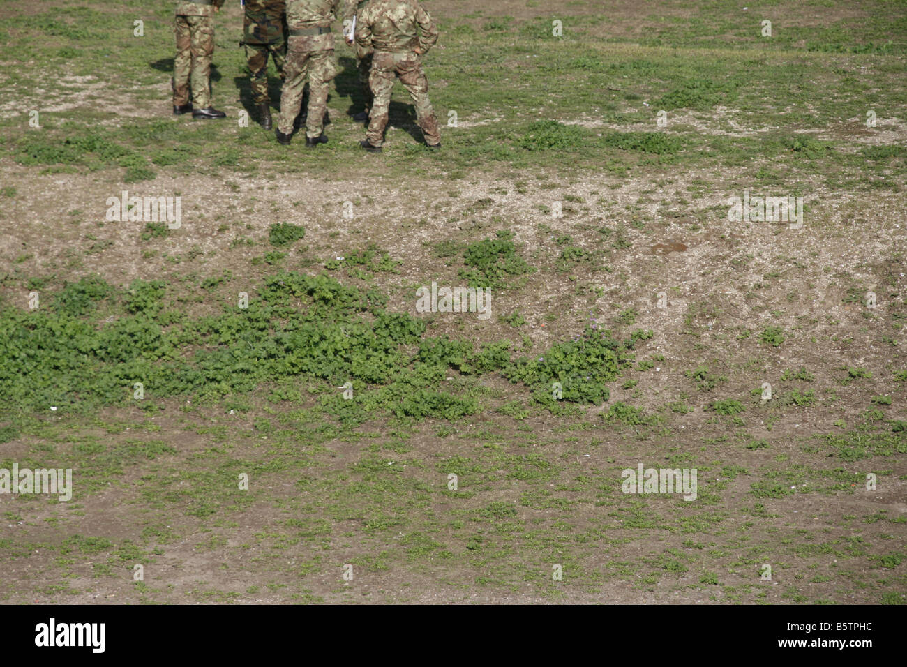 group of soldiers standing in field Stock Photo - Alamy