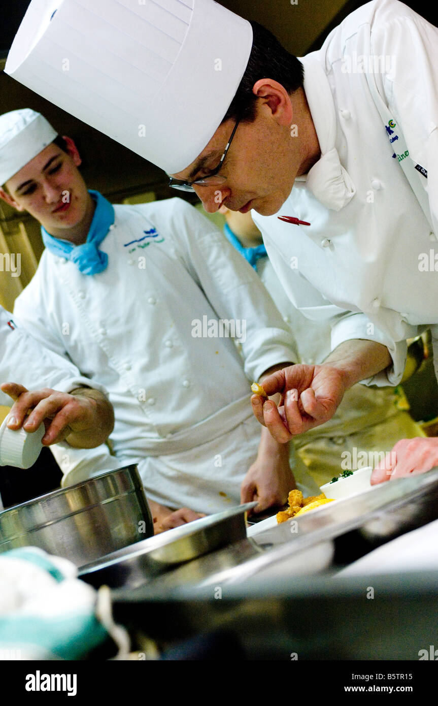 2 student chefs prepare food in the kichen at Westminster and Kingsway ...