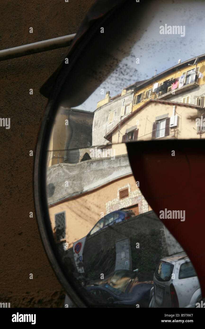 road safety circular mirror with buildings reflection in italy Stock ...