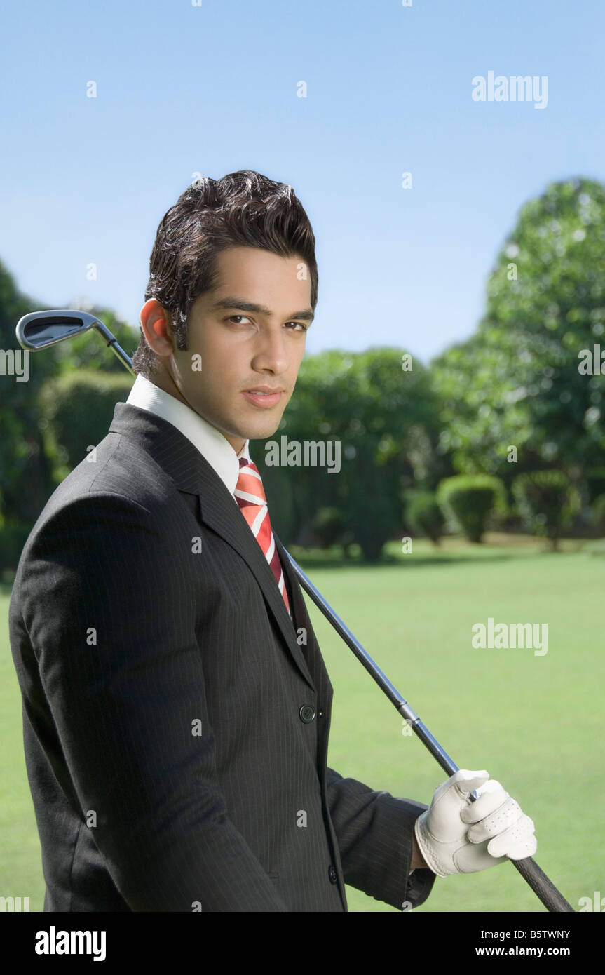 Business executive playing golf hi-res stock photography and images - Alamy