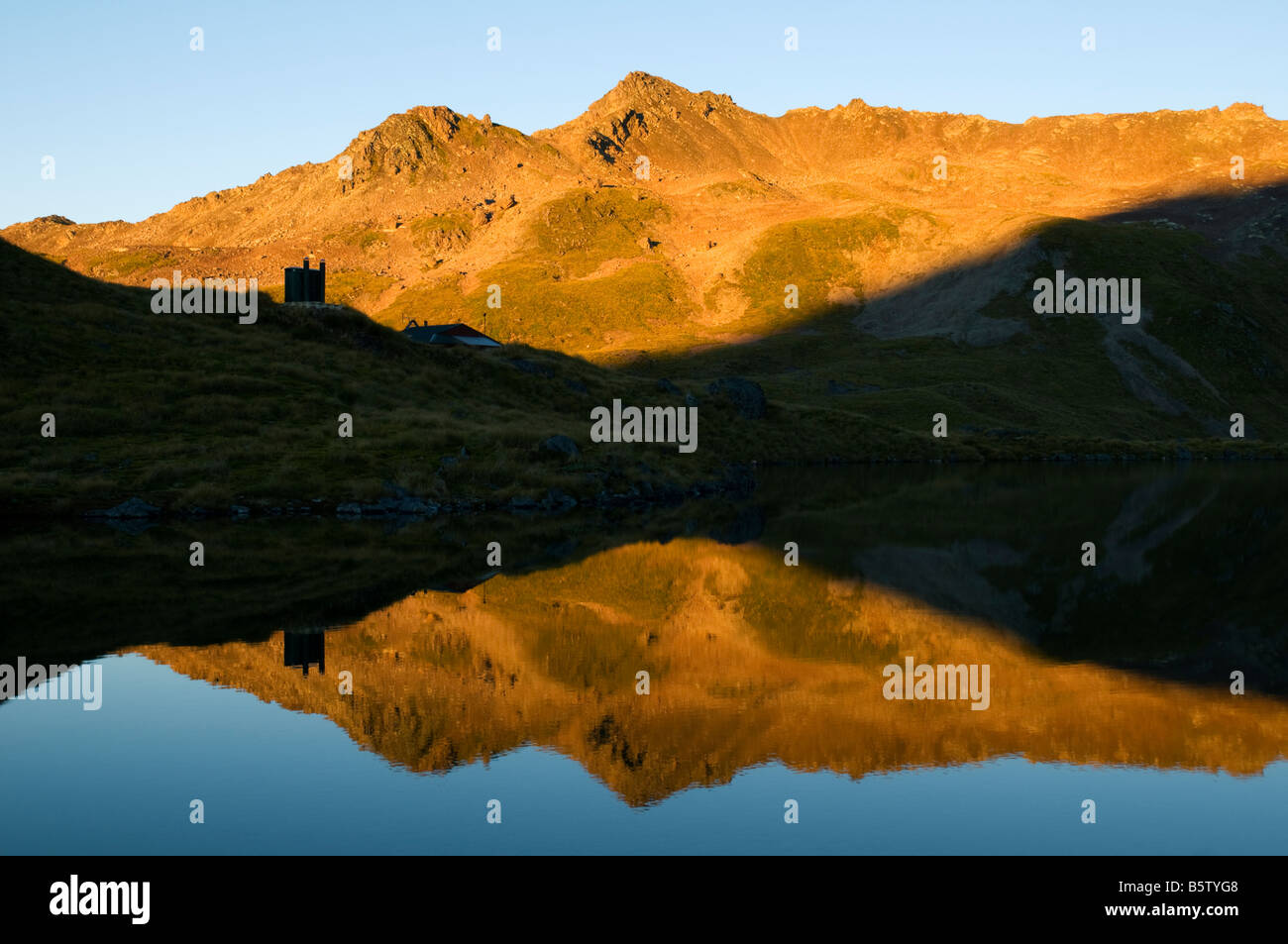 Lake Angelus and the Angelus Hut at sunrise, Nelson Lakes National Park ...