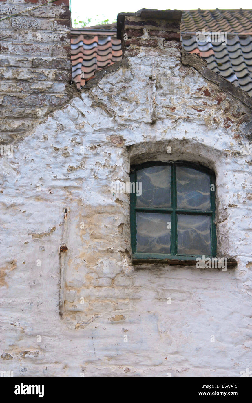 A window with cob webs in the Beguinage in Kortrijk Stock Photo - Alamy