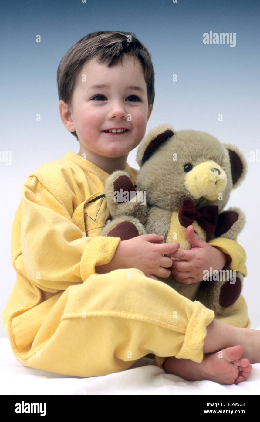 little boy with his teddy bear Stock Photo - Alamy