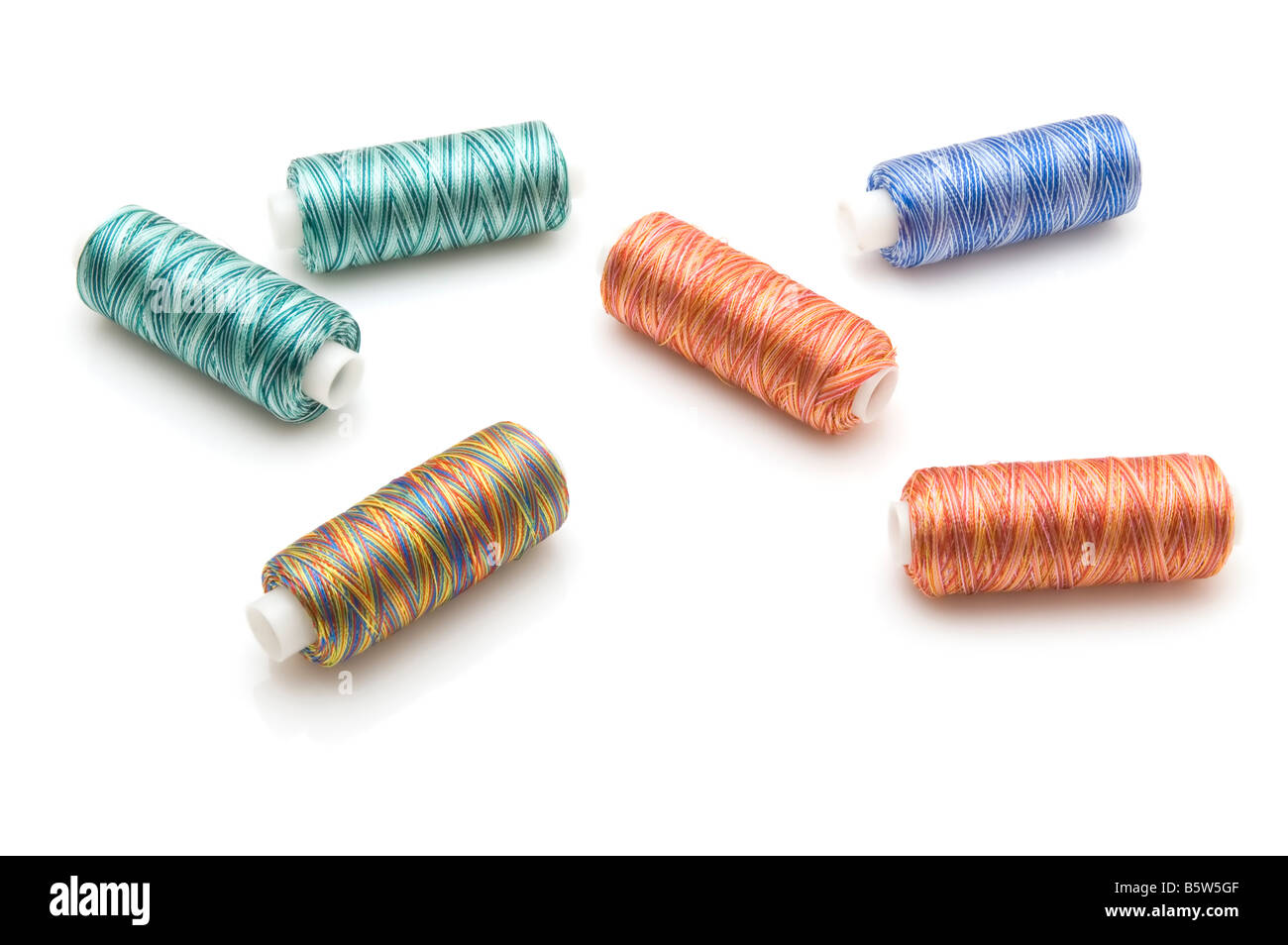 object on white tool Multicolored sewing rolls Stock Photo - Alamy