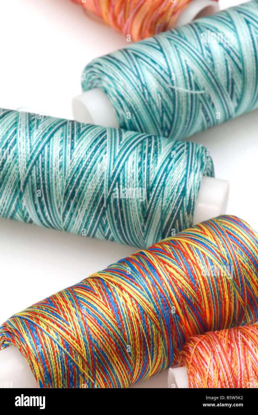 object on white tool Multicolored sewing rolls Stock Photo - Alamy