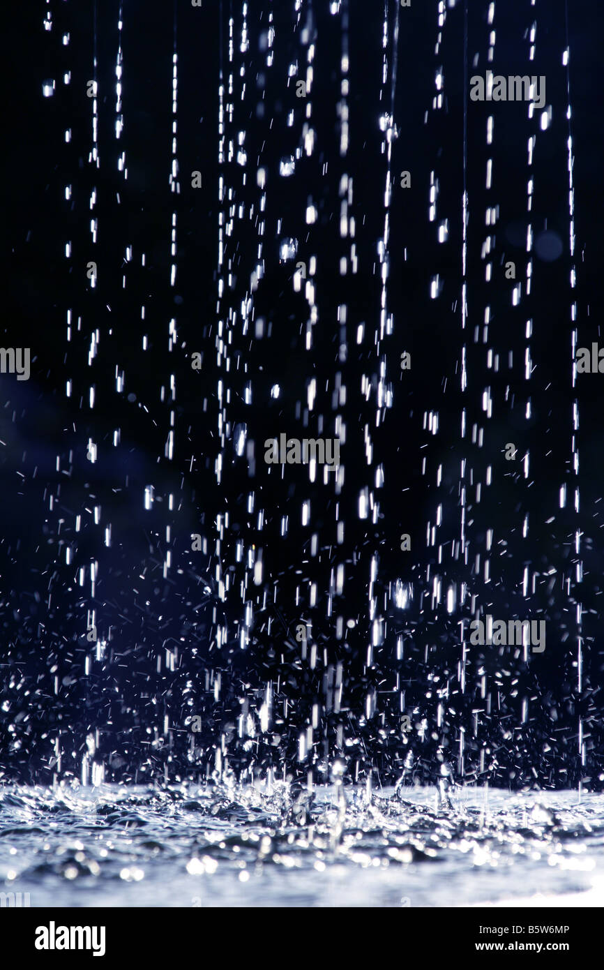 abstract many water drops falling on ground floor Stock Photo - Alamy