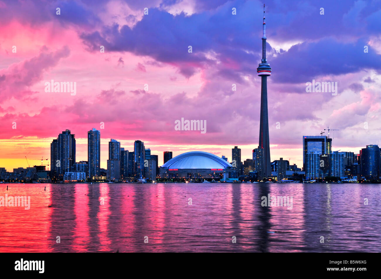 Scenic view at Toronto city waterfront skyline at sunset Stock Photo ...