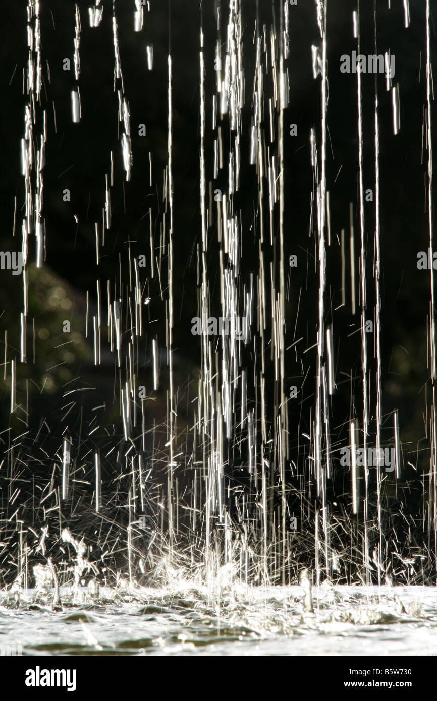 abstract many water drops falling on ground floor Stock Photo - Alamy
