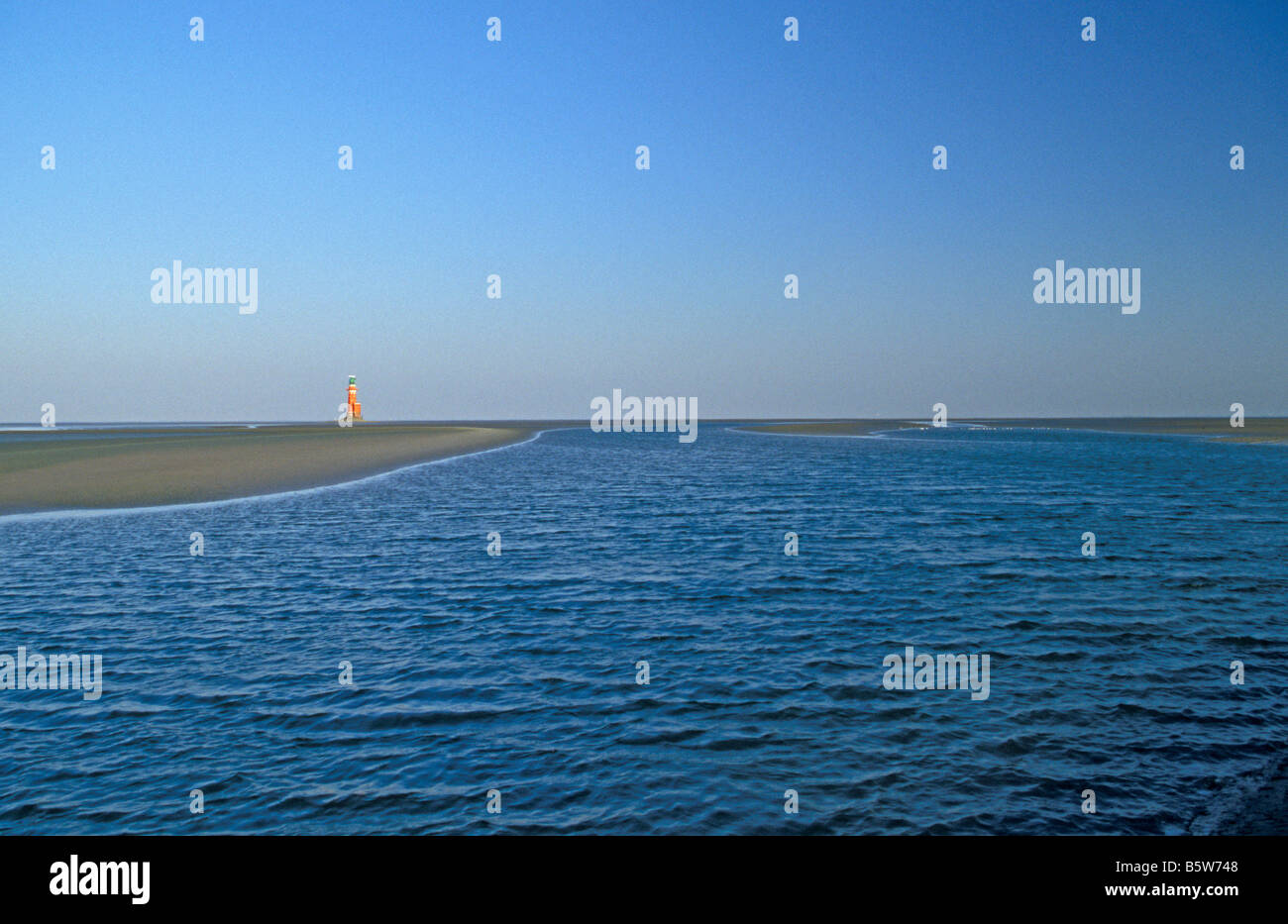 lighthouse at wadden sea Stock Photo - Alamy