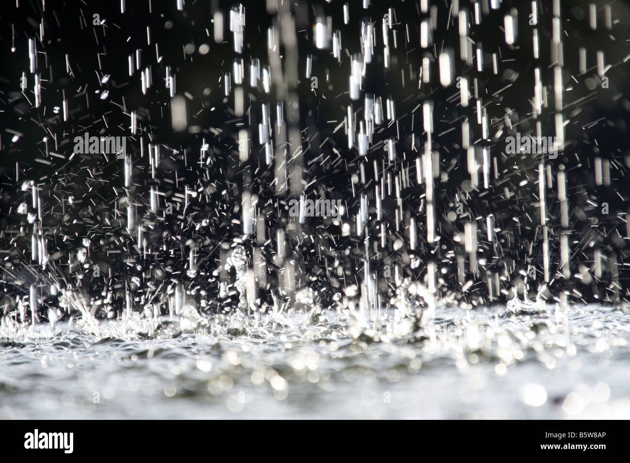 abstract many water drops falling on ground floor Stock Photo - Alamy
