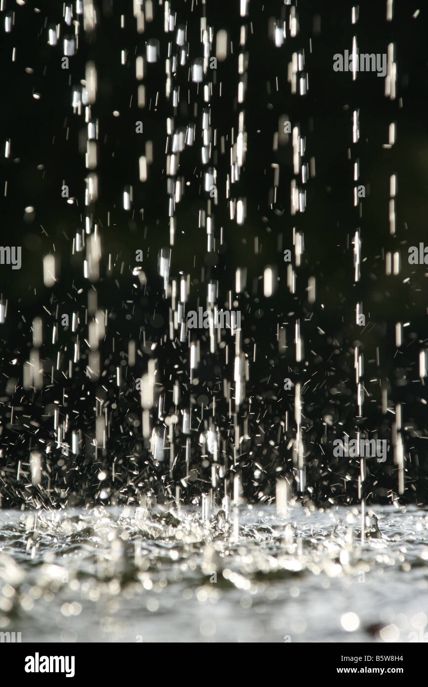 abstract many water drops falling on ground floor Stock Photo - Alamy