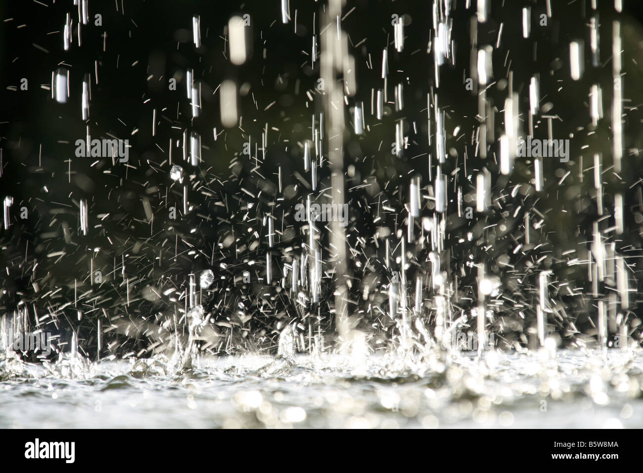 abstract many water drops falling on ground floor Stock Photo - Alamy