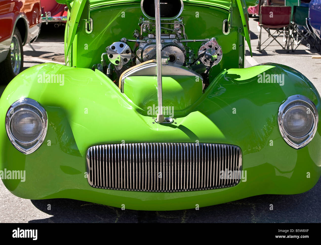 Lime green supercharged V8 hot rod Stock Photo - Alamy