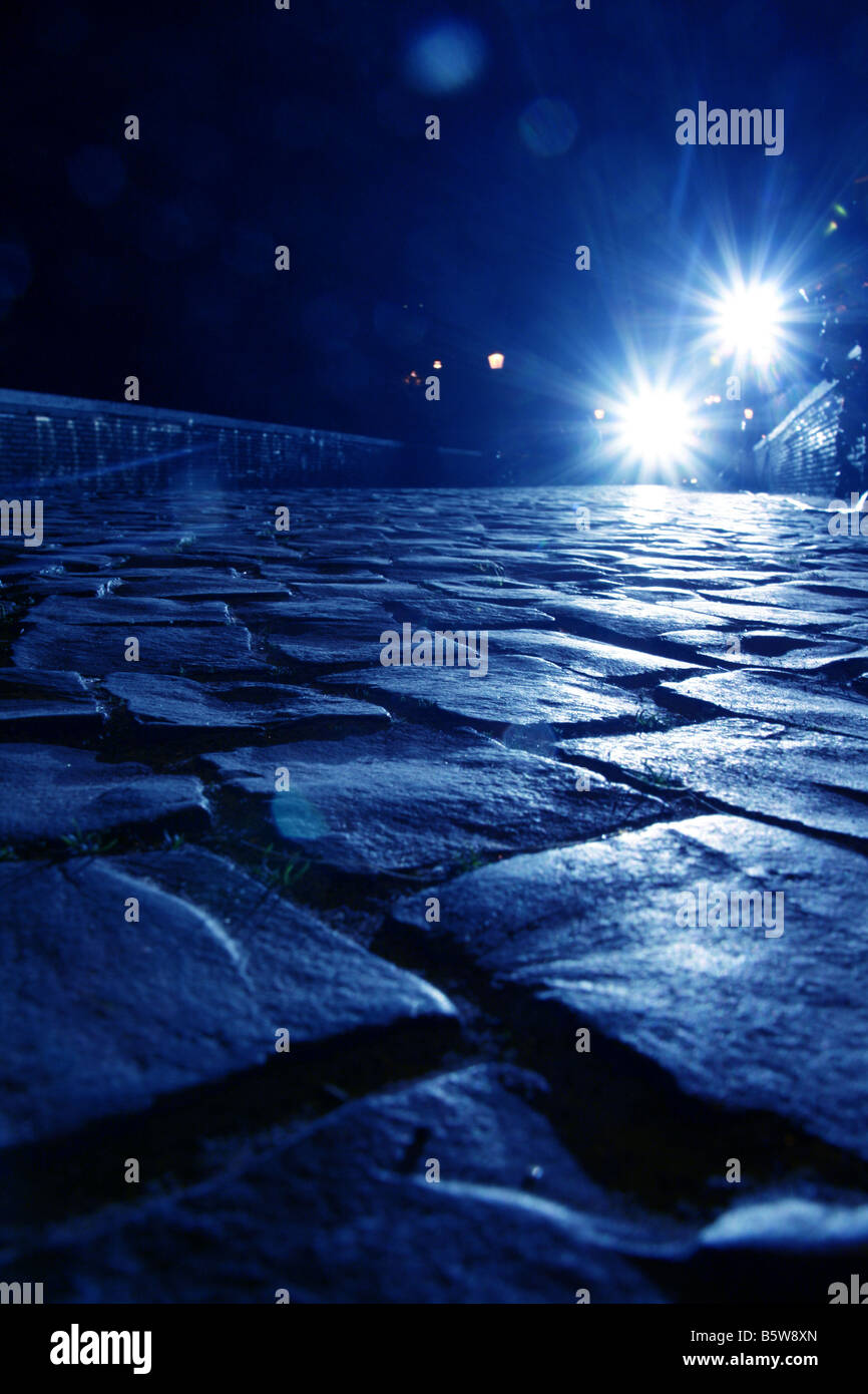 empty vacant desolate dark street alley at night Stock Photo - Alamy