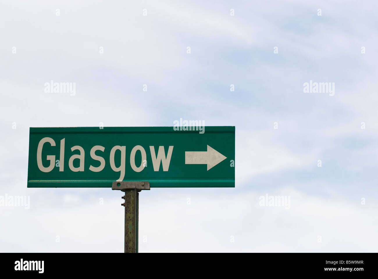 Glasgow sign with blue sky and clouds Stock Photo - Alamy