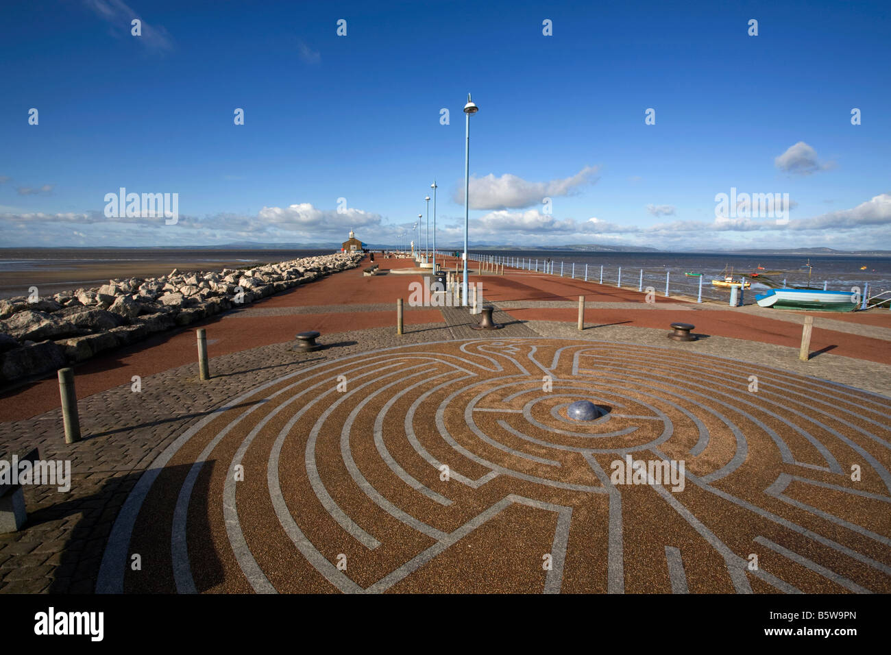 Stone Jetty at Morecambe with maze in foreground Stock Photo - Alamy
