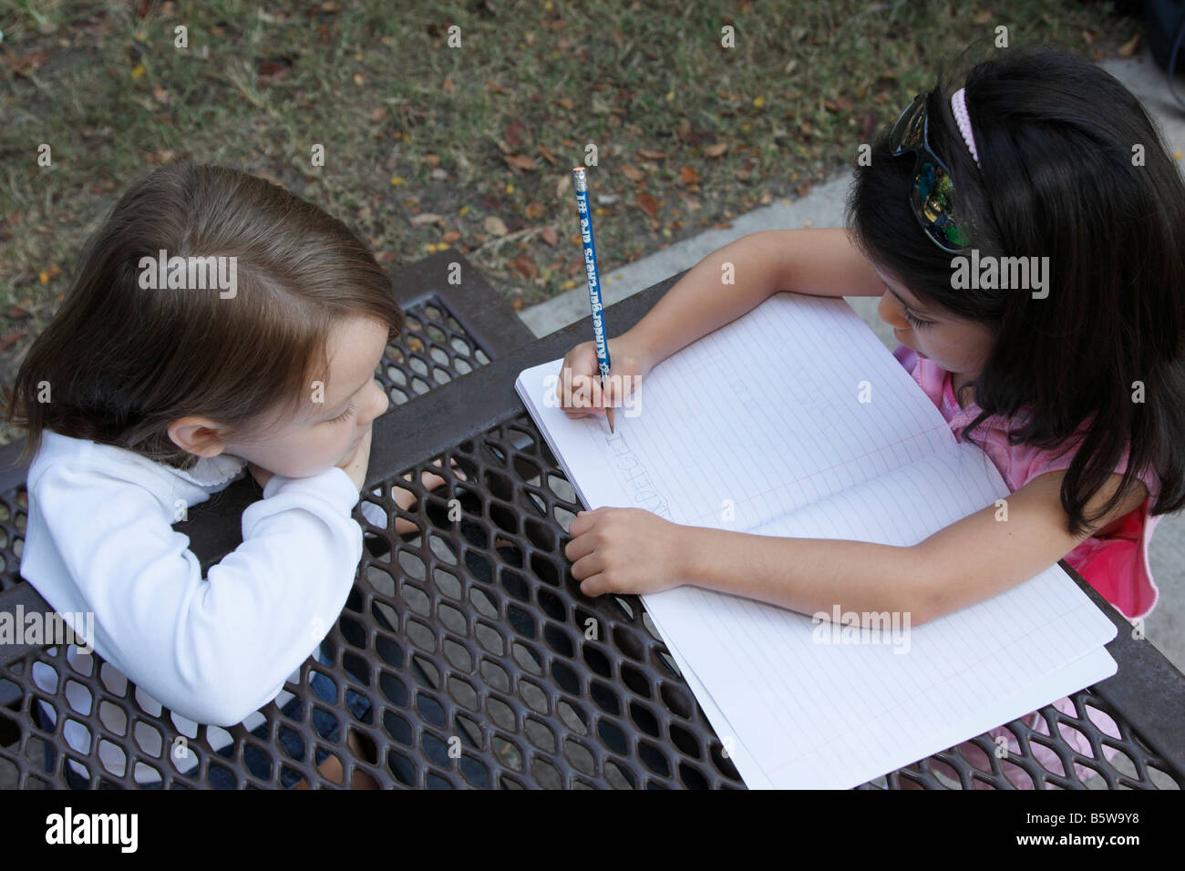 Two girls writing letters hi-res stock photography and images - Alamy