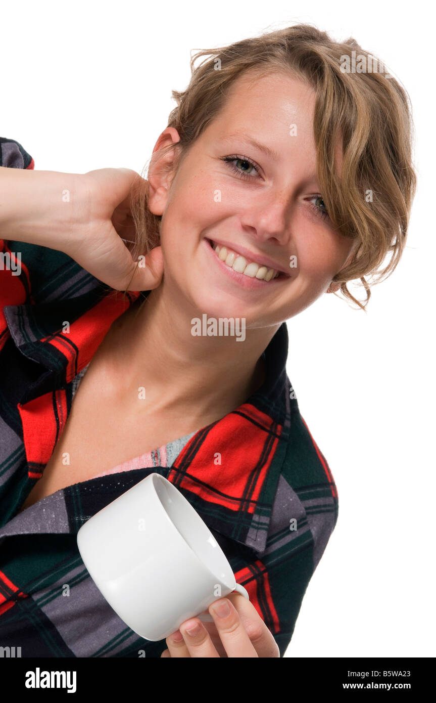 Young worker drinking coffee Stock Photo - Alamy